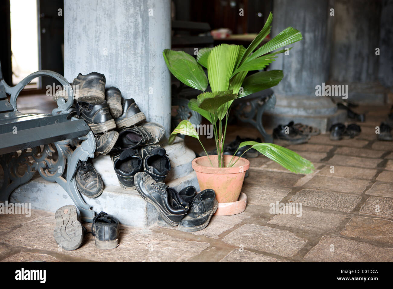 Shoes piled in porch of St Francis Church, Fort Kochin, Kerala, India ...