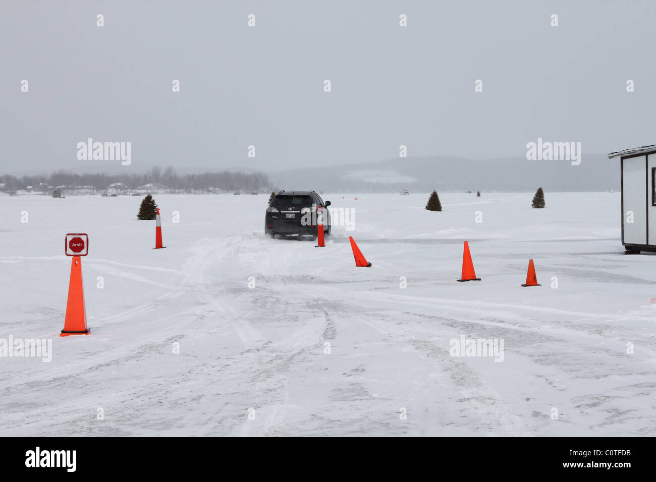 Winter ice bridge to ice fishing houses Stock Photo - Alamy