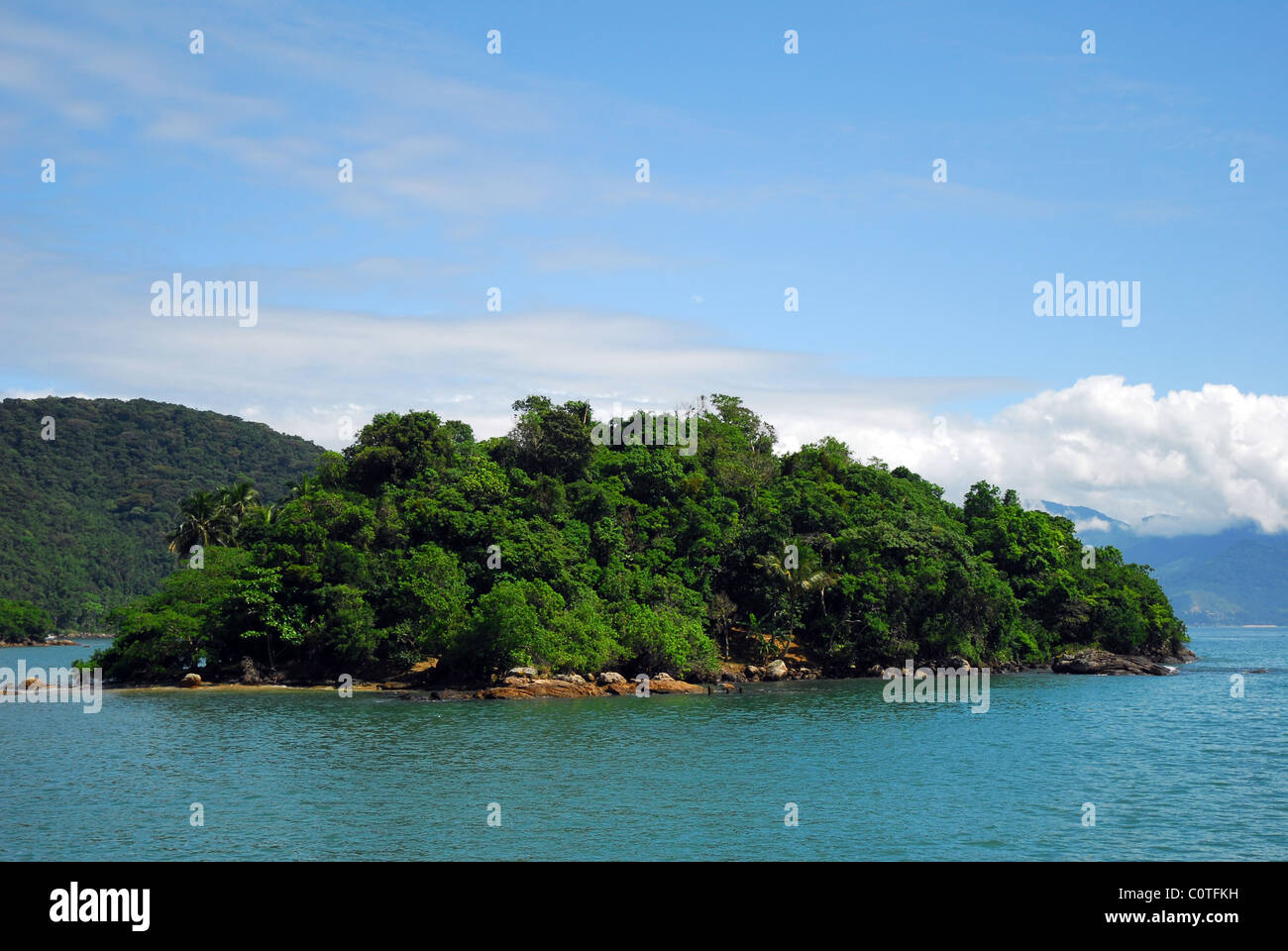 Tropical island covered in vegetation, near Ilha Grande, Rio de Janeiro ...