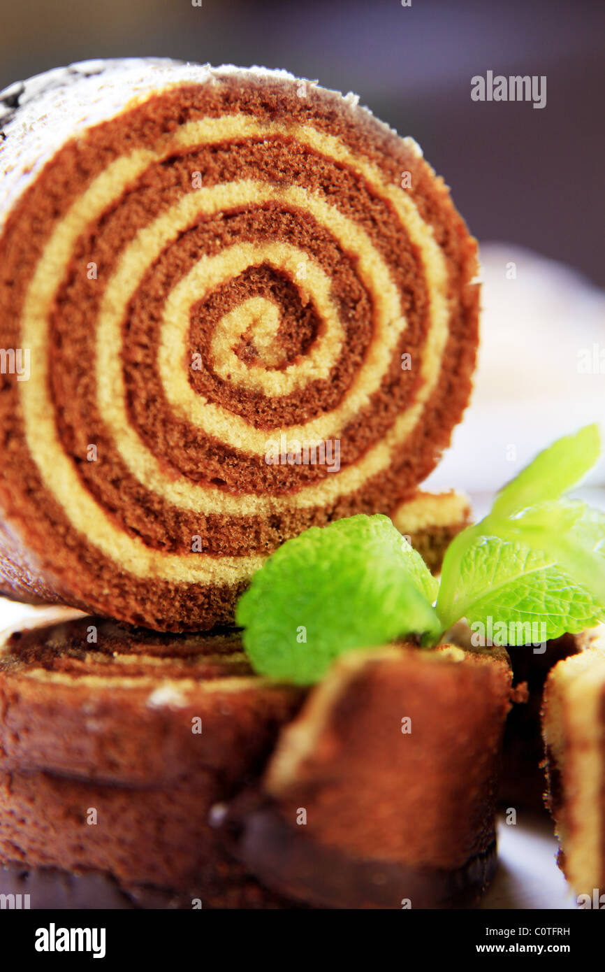 Slices of sponge cake roll - detail Stock Photo - Alamy