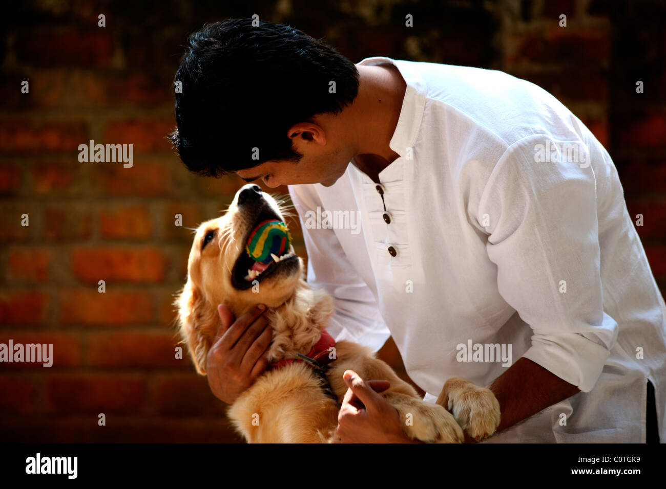 Indian boy and dog hi-res stock photography and images - Alamy