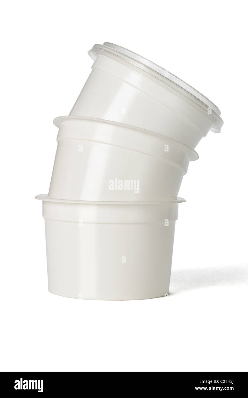 Stack of plastic containers on white background Stock Photo - Alamy