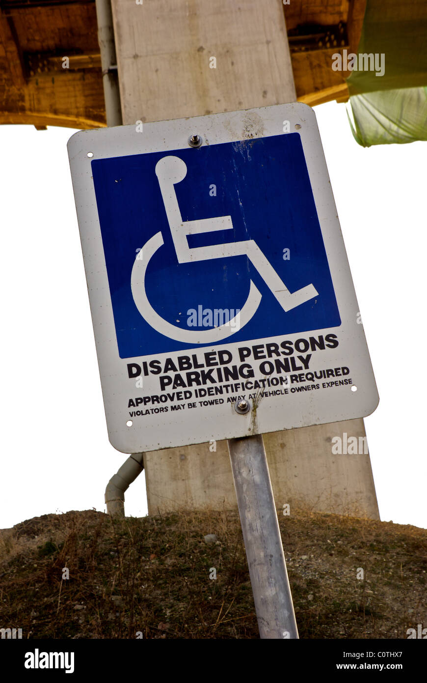 Disabled persons parking space sign Stock Photo - Alamy