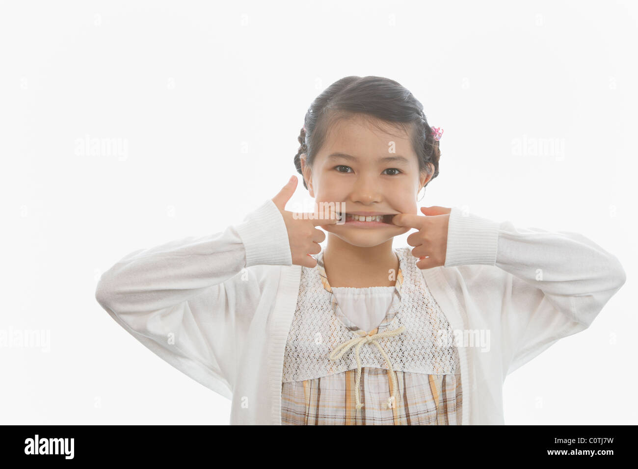 Girl Showing Teeth Stock Photo - Alamy