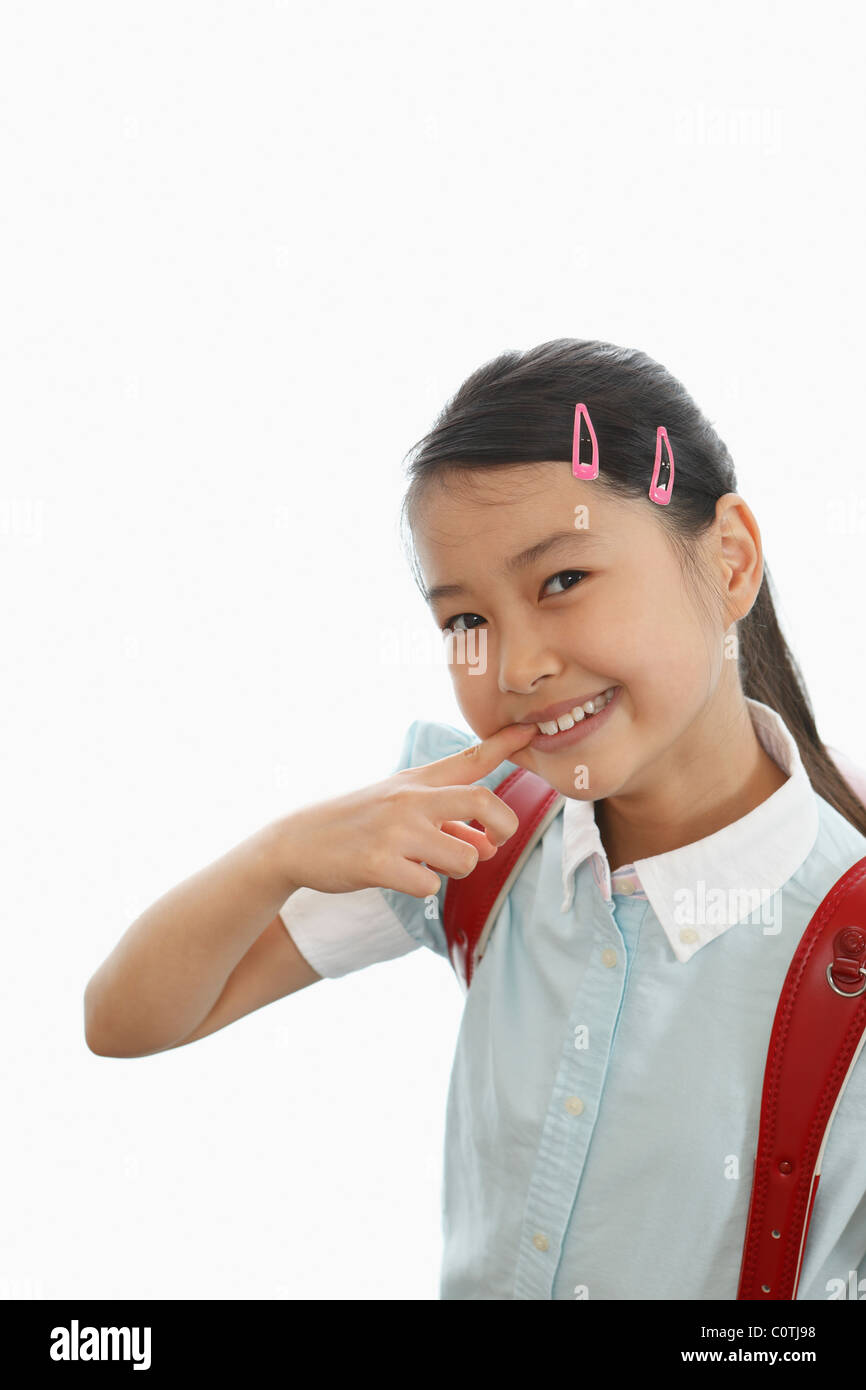 Girl Touching Teeth Stock Photo - Alamy
