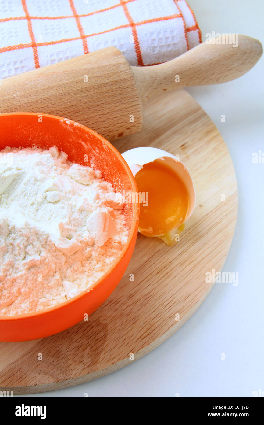 Basic baking ingredients eggs, flour Stock Photo - Alamy