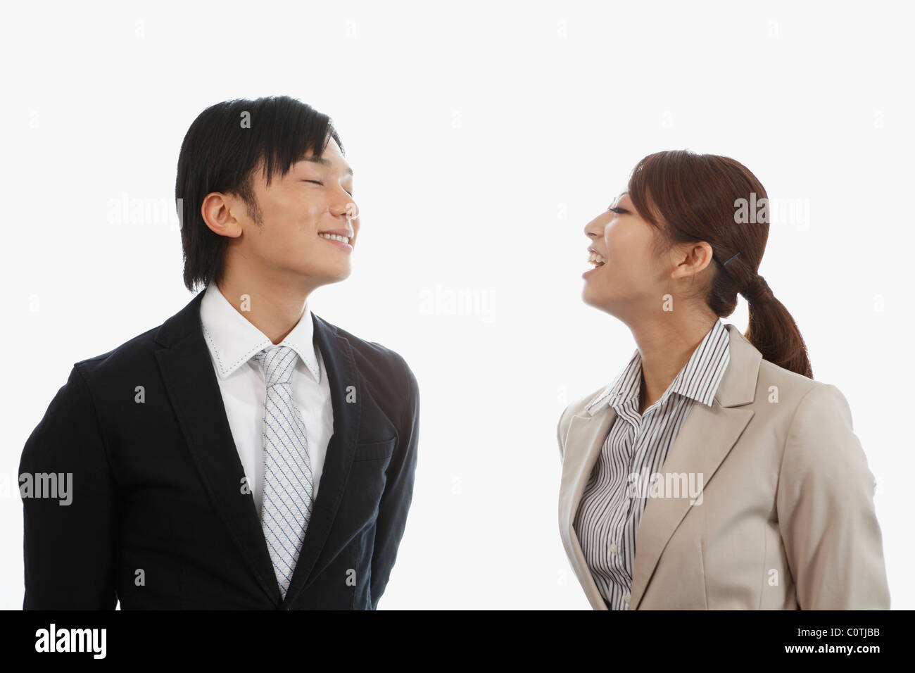 Mid Adult Man Smelling Young Woman's Breath Stock Photo - Alamy