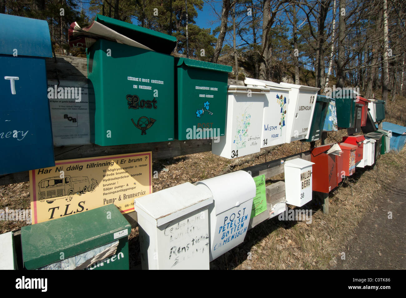 Lots of mailboxes in a row Stock Photo - Alamy