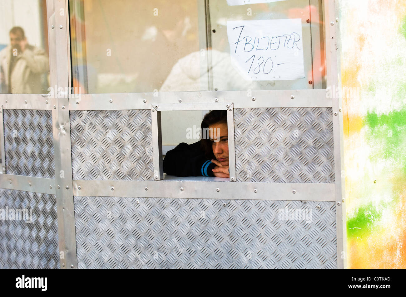 Girl selling tickets Stock Photo - Alamy