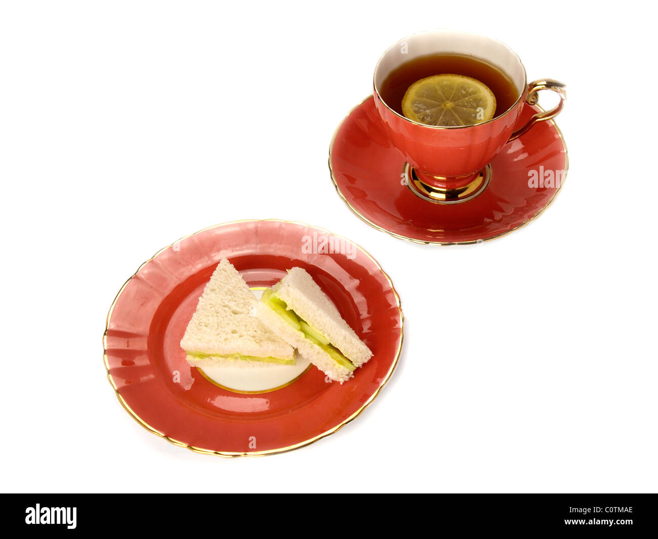 Red cup, plate and saucer Stock Photo - Alamy