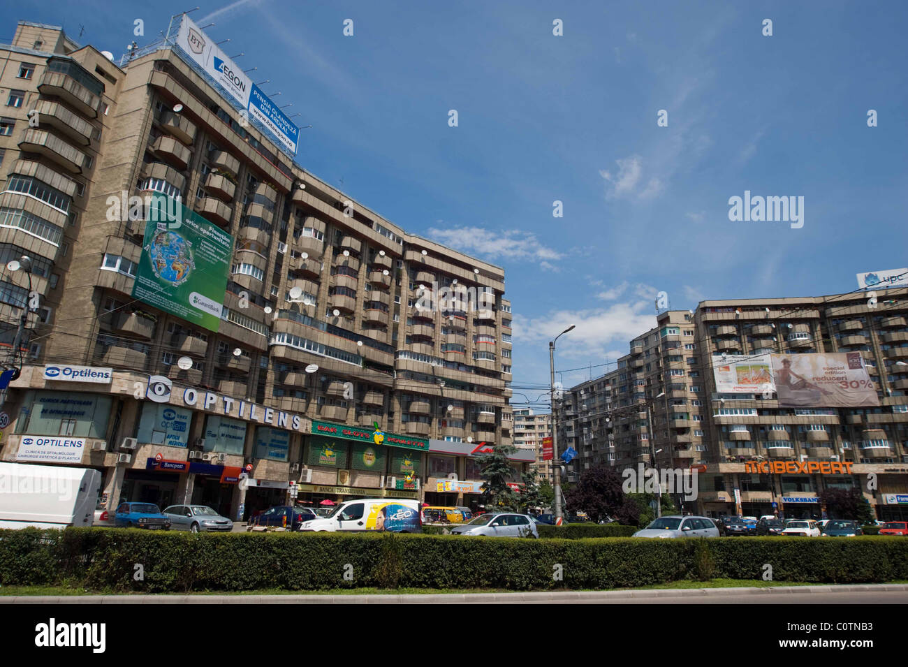 Communist-era blocks on a busy street in Cluj-Napoca, Romania Stock ...