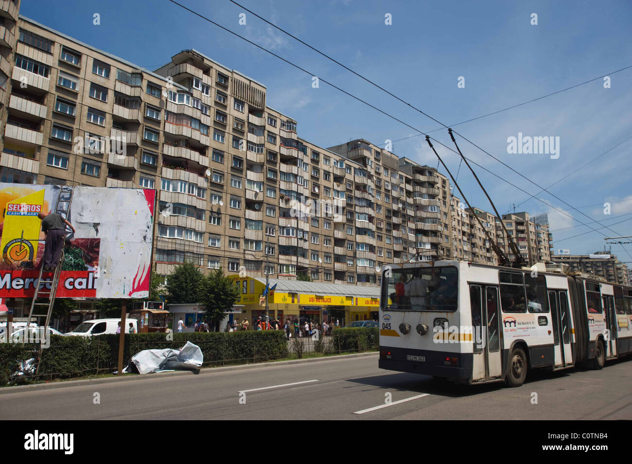 Communist-era blocks on a busy street in Cluj-Napoca, Romania Stock ...