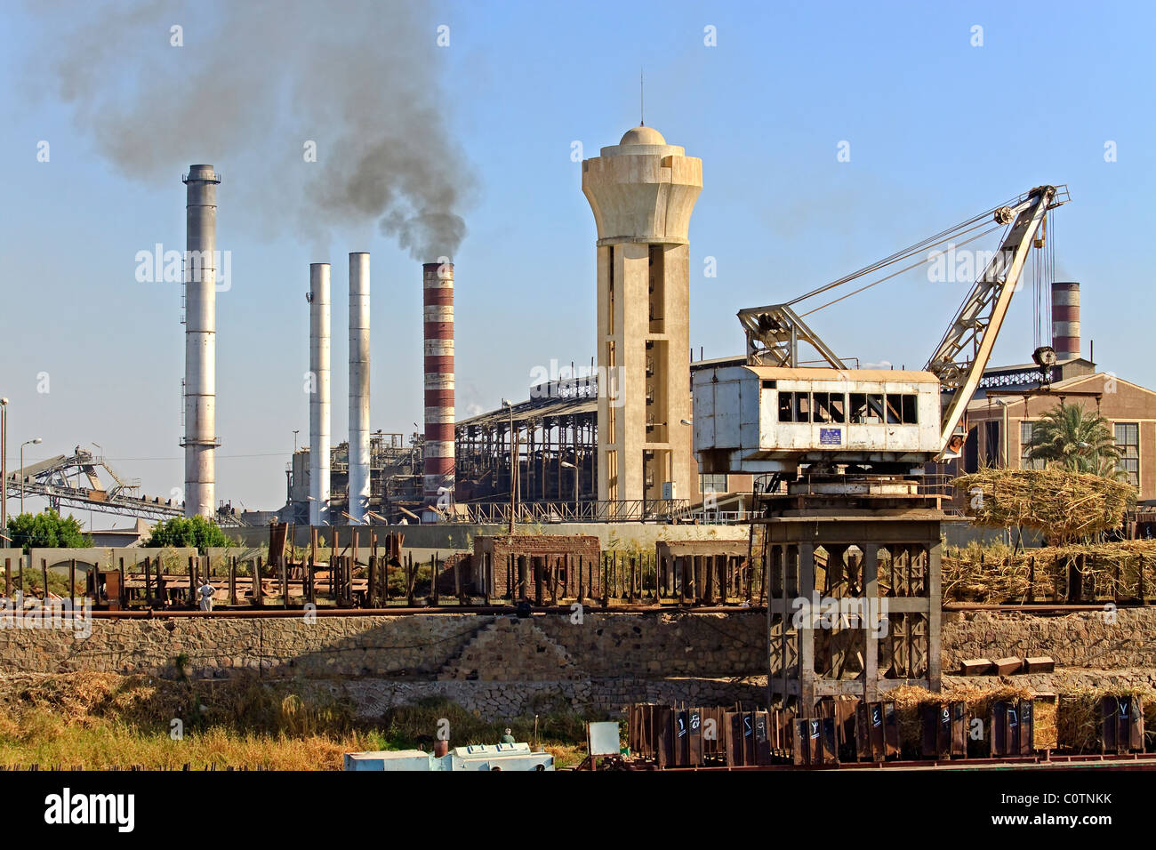 Egypt Nile Factory Belching Smoke Stock Photo - Alamy
