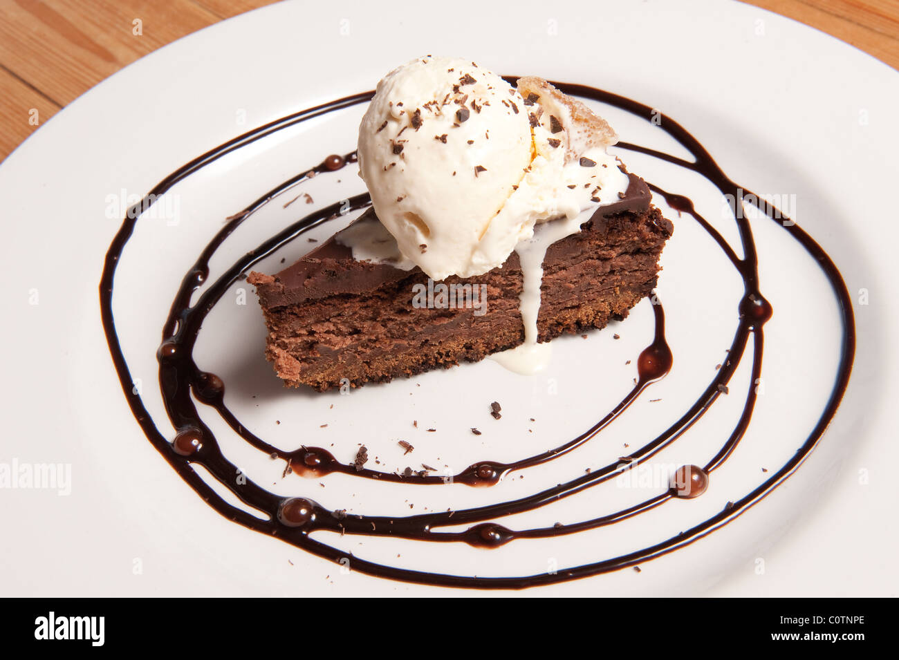Belgian chocolate cheesecake with ginger ice cream Stock Photo - Alamy