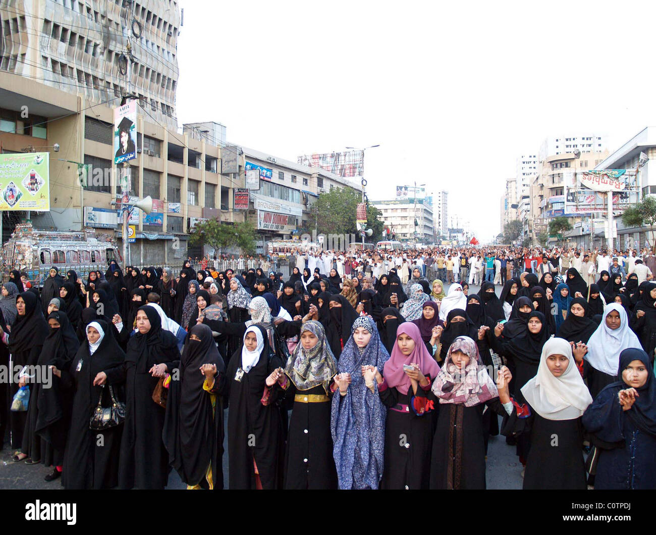 Supporters of Majlis Wahdat-e-Muslimeen (MWM) pass through MA.Jinnah ...