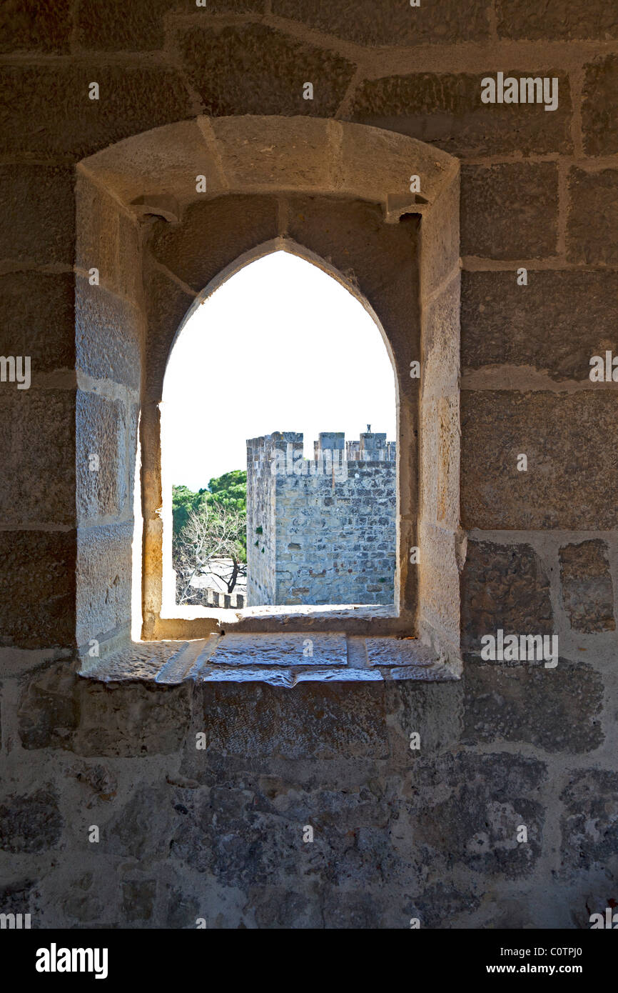 Gothic window of a watchtower of Sao Jorge (St. George) Castle in ...