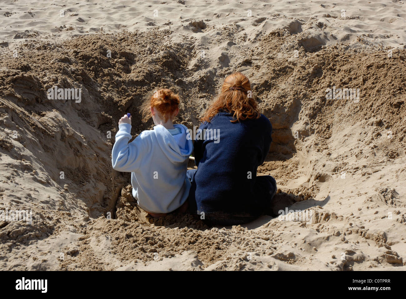 Digging back view hi-res stock photography and images - Alamy