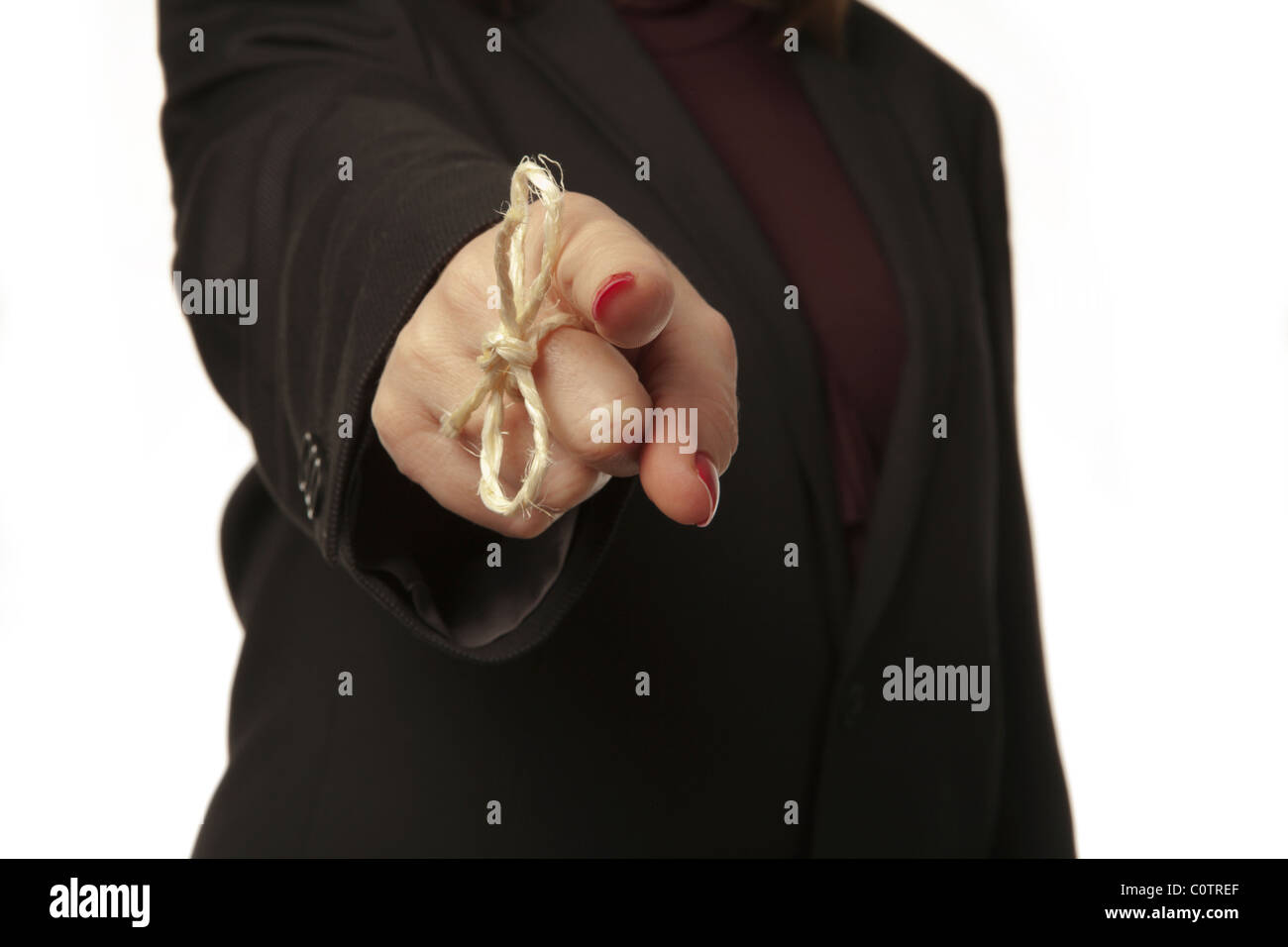 woman point her finger with string to remind you of something Stock ...