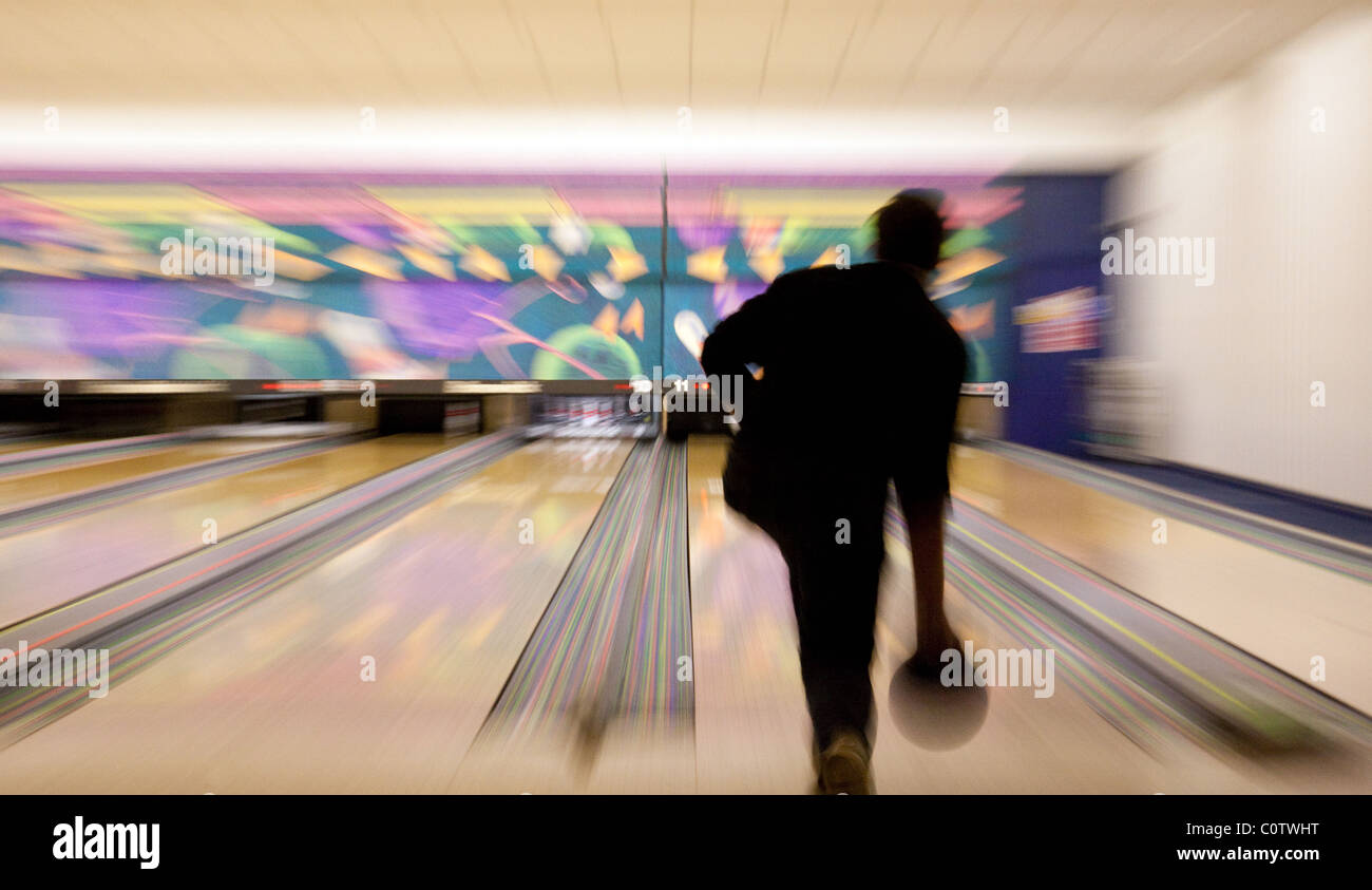 A man ten pin bowling, "Strikes" bowling alley, Ely, UK Stock Photo - Alamy