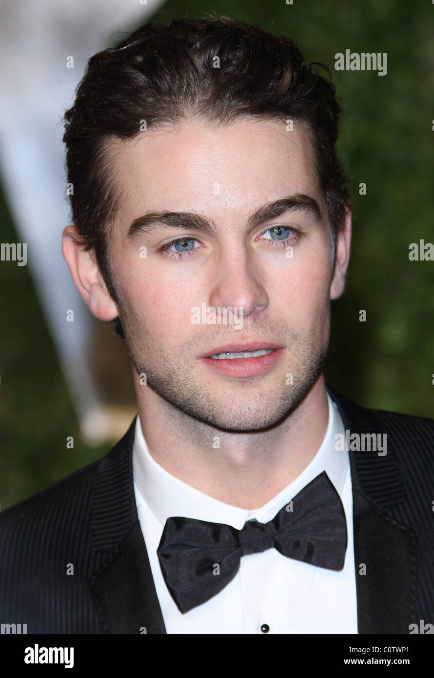 CHASE CRAWFORD 2011 VANITY FAIR OSCAR PARTY LOS ANGELES CALIFORNIA USA ...