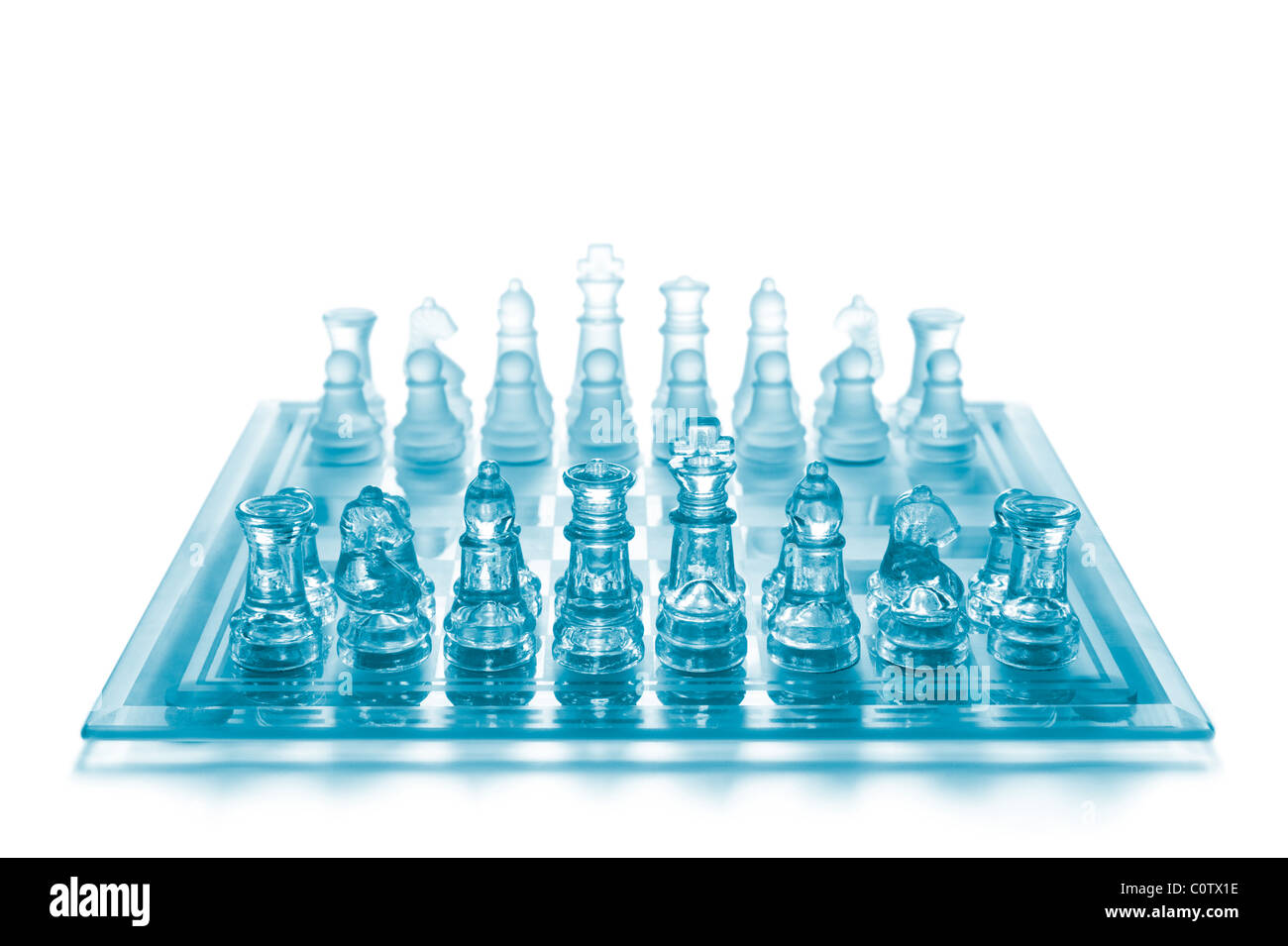 Glass chess on chess board Stock Photo - Alamy