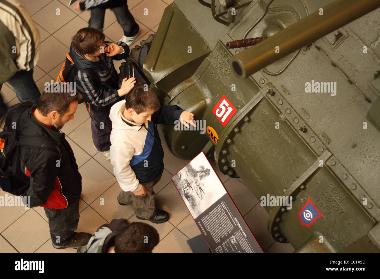 London Imperial War Museum visitors read the information about a WW2 ...