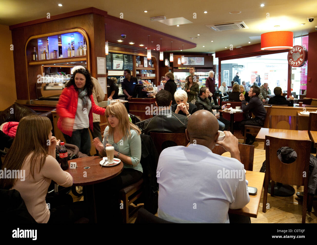 People enjoying coffee in the Costa Coffee bar, the Glades shopping ...