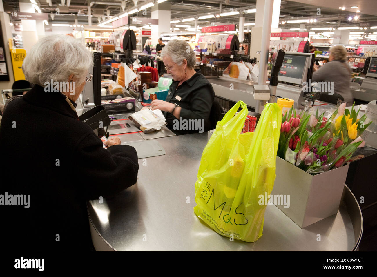 People paying for food at the checkout, Marks and Spencer store, M&S ...