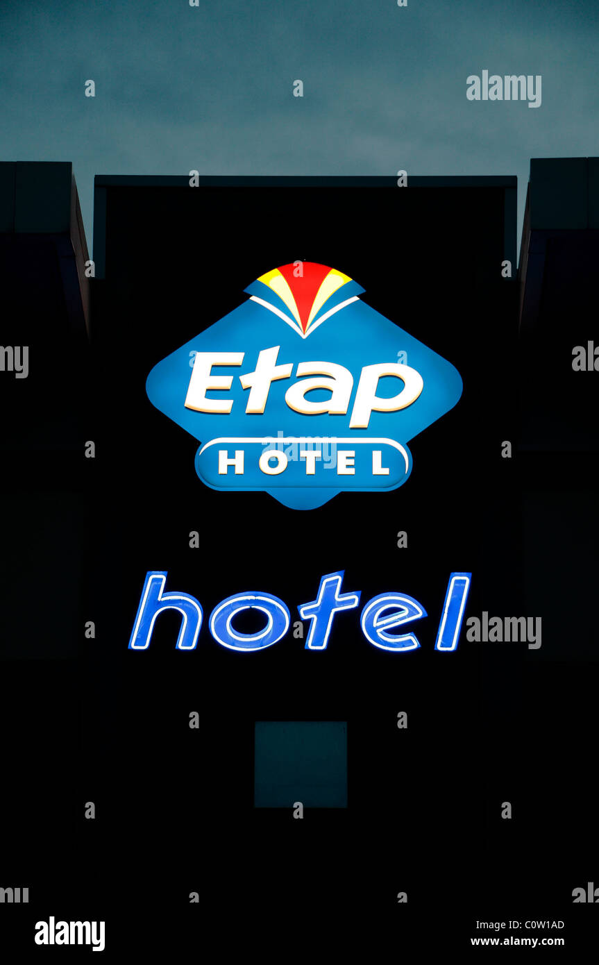 An evening view of the illuminated Etap budget hotel logo outside the ...