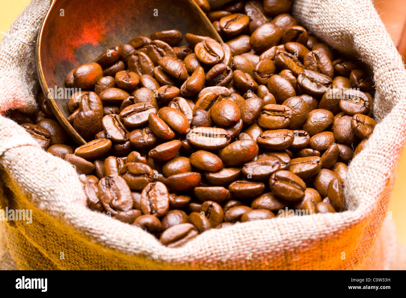 Sack of coffee beans and scoop Stock Photo - Alamy
