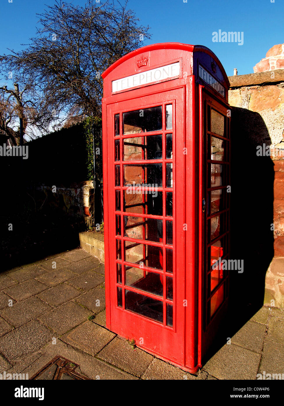A red Telephone booth in the Historic Scottish Town of Cromarty Stock ...
