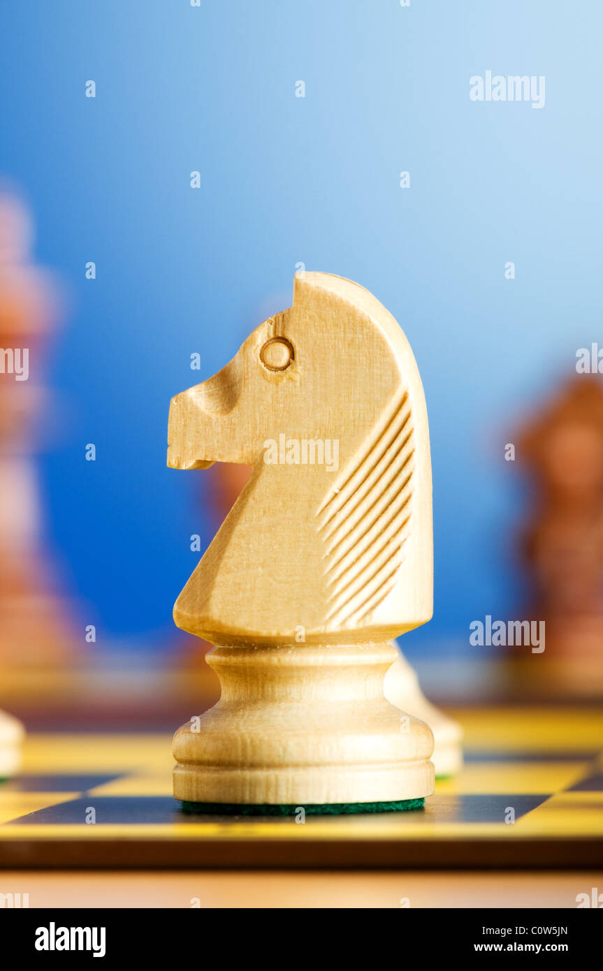 Set of chess figures on the playing board Stock Photo - Alamy