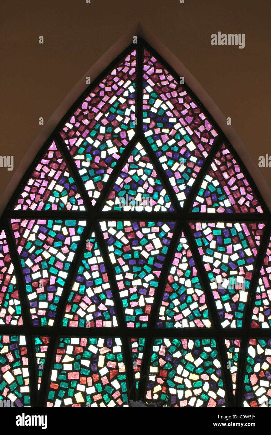 Stained glass window is formed in the shape of an arch Stock Photo - Alamy
