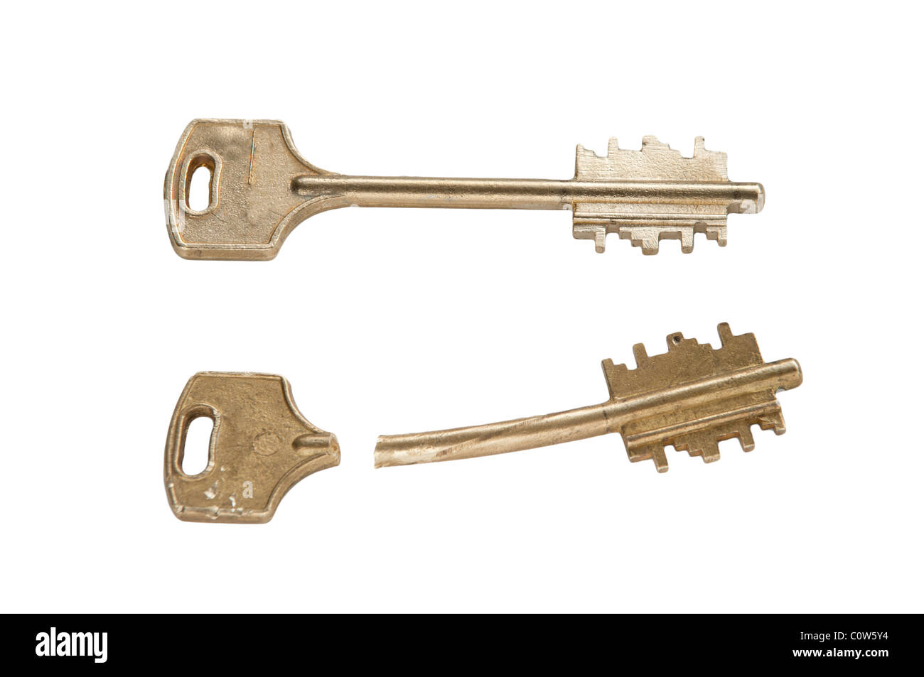 golden broken key on white background isoleted Stock Photo - Alamy