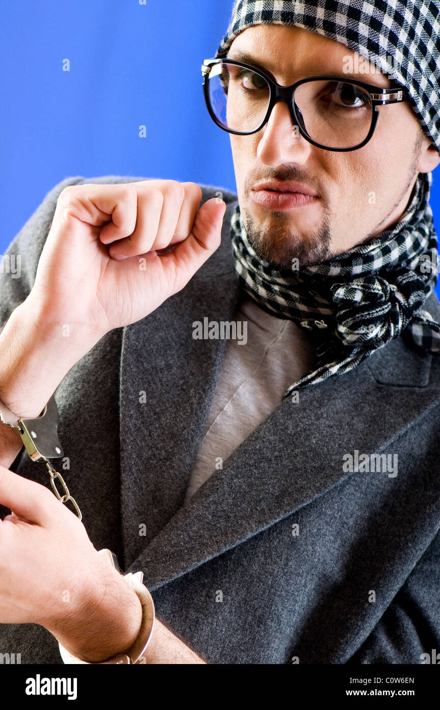 Man with glasses in studio shooting Stock Photo - Alamy