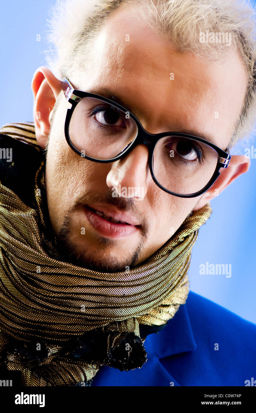 Man with blue jacket in studio shooting Stock Photo - Alamy