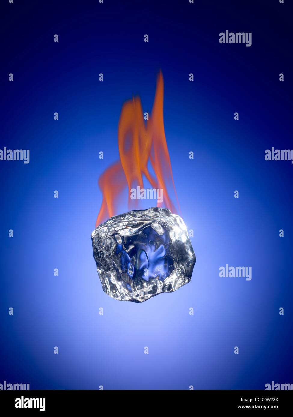 Ice Cube On Fire Stock Photo - Alamy