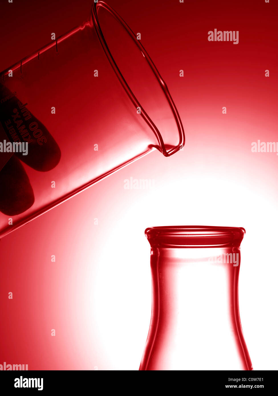 Glass Beakers In Lab With Hand Stock Photo - Alamy