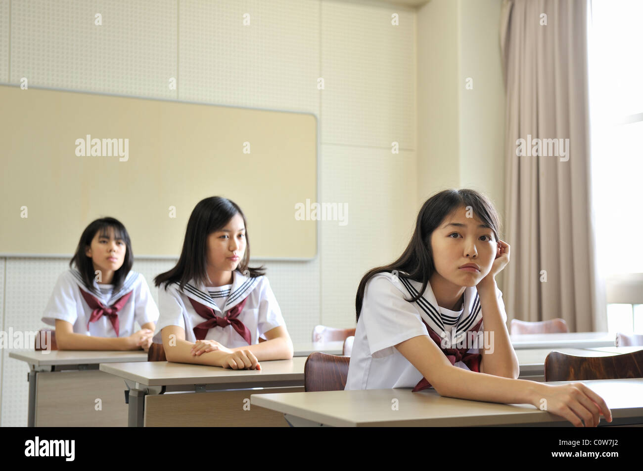 High School Girls Sitting in Classroom Stock Photo - Alamy