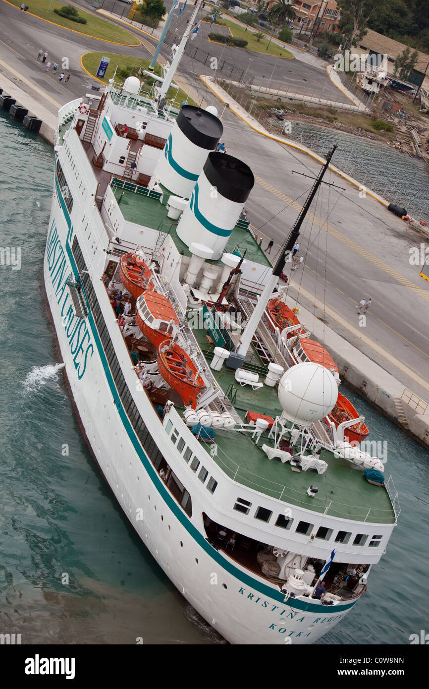 Old fashioned ship being used as cruise ship arriving morning at town ...