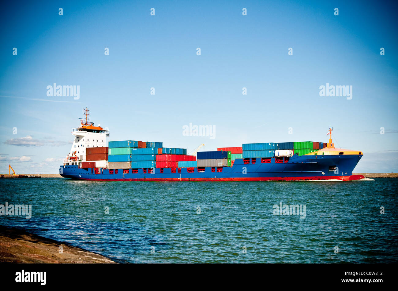 container ship coming into port Stock Photo - Alamy