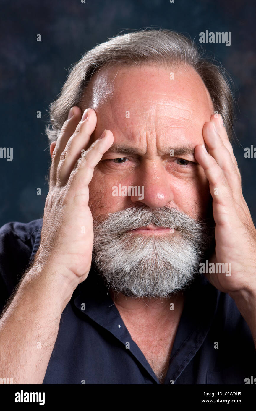 Man holding head in distress hi-res stock photography and images - Alamy