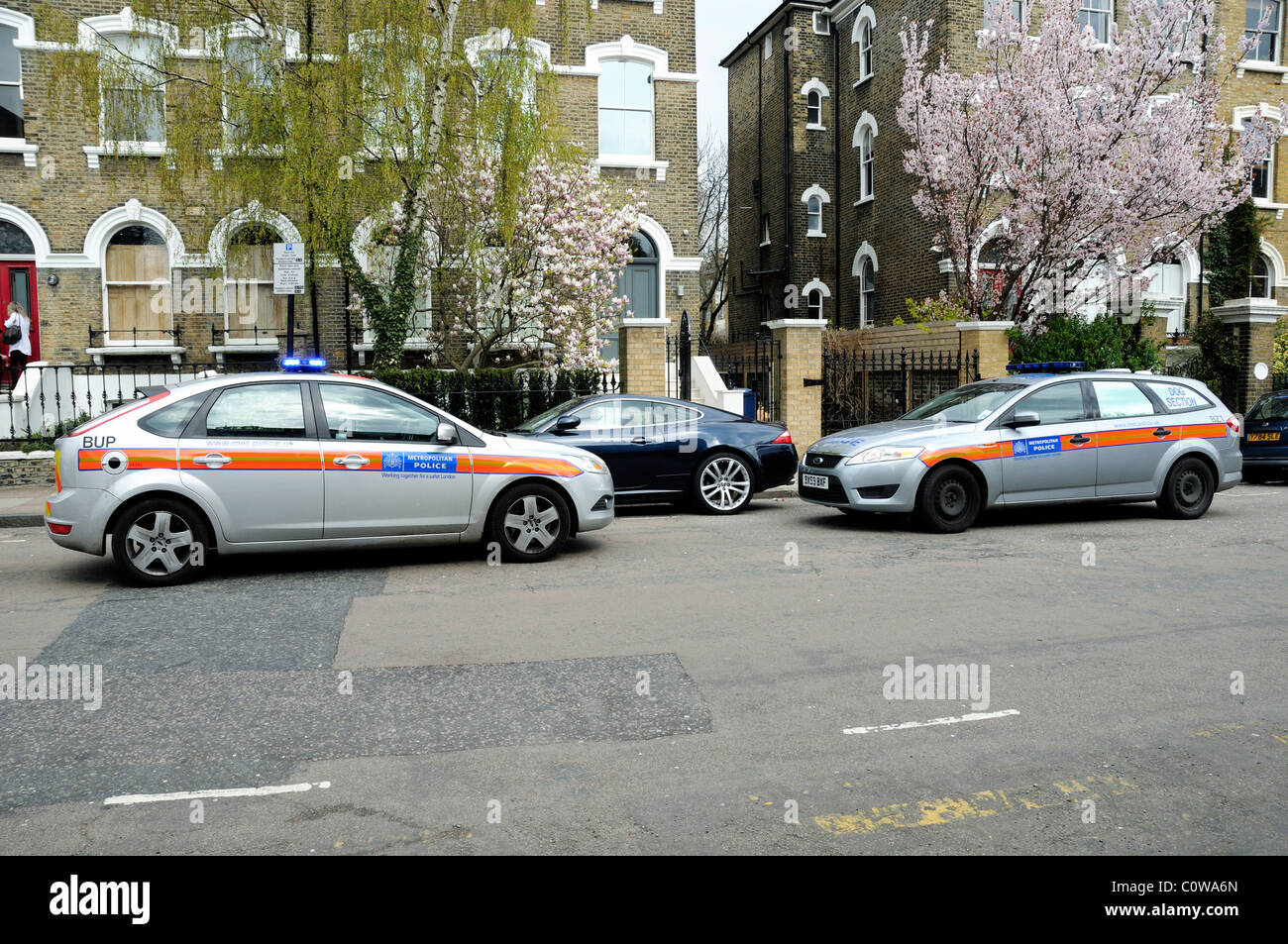 Two Metropolitan Police Cars facing each other attending an incident on ...