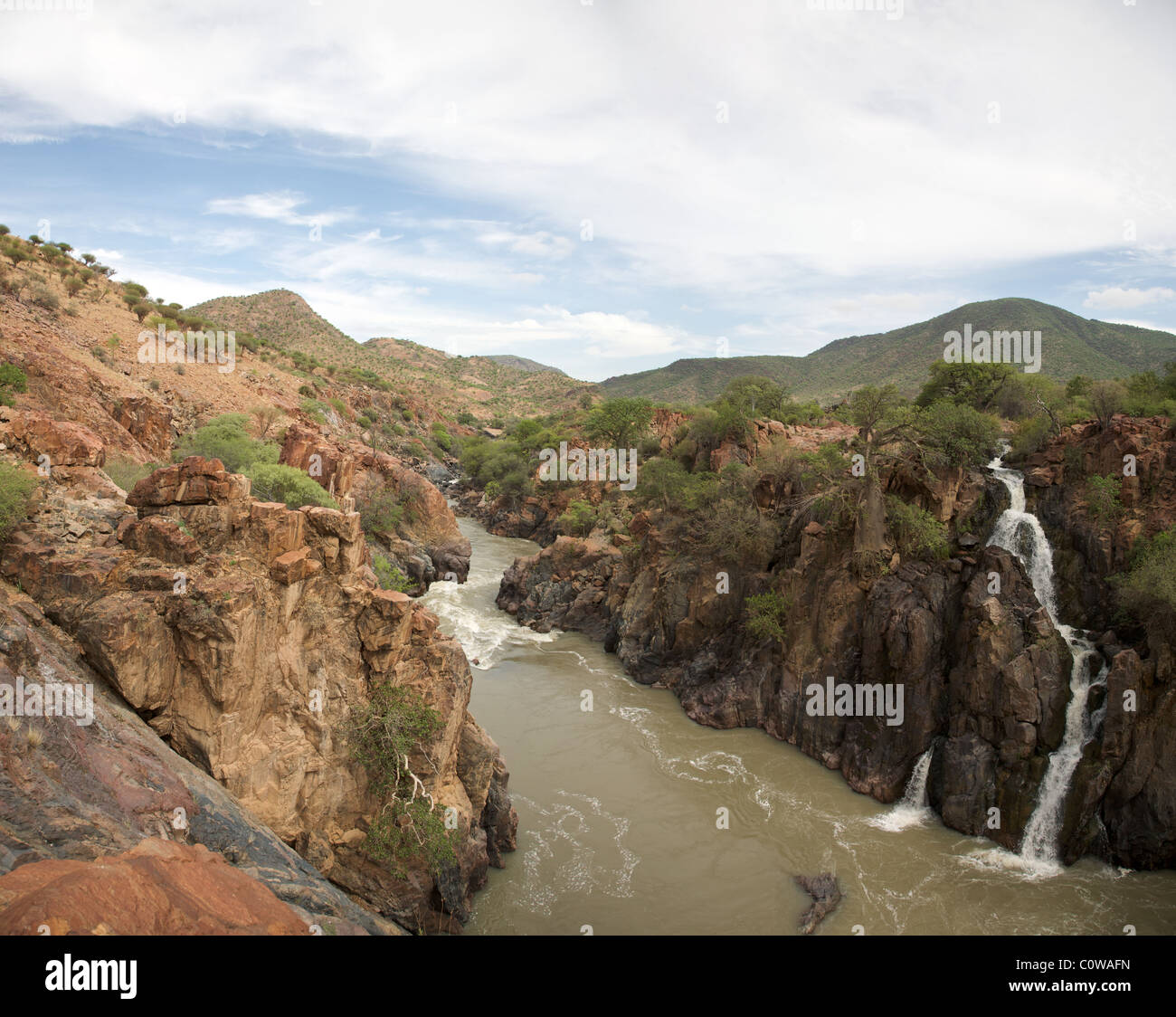 The Epupa Falls lie on the Kunene River, on the border of Angola and ...