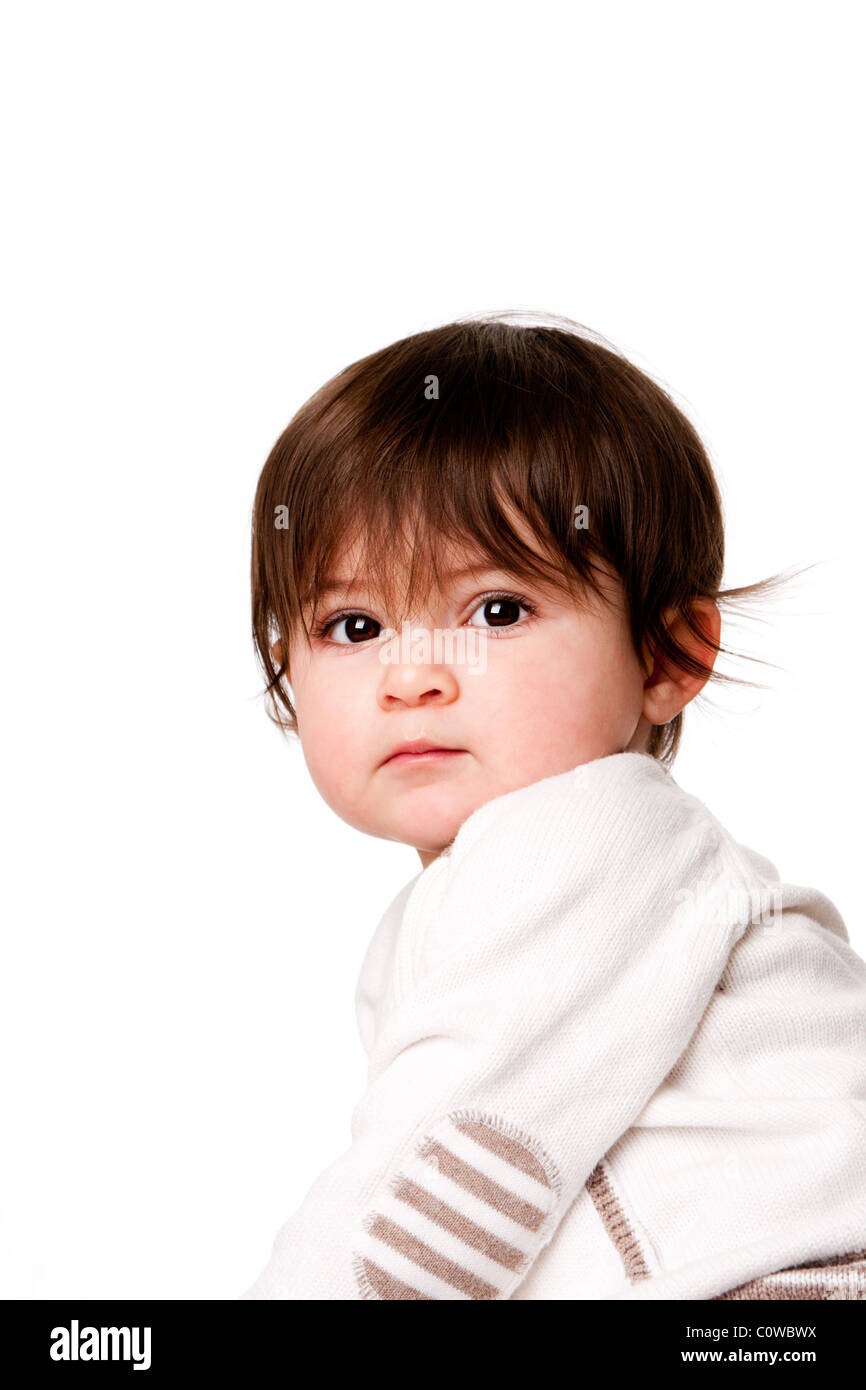 Face of a cute adorable baby infant toddler with innocent surprised ...