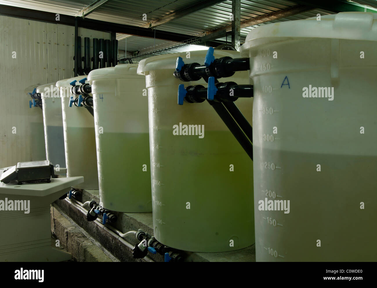 Nutrient solution containers used in a hydroponic farming facility on ...