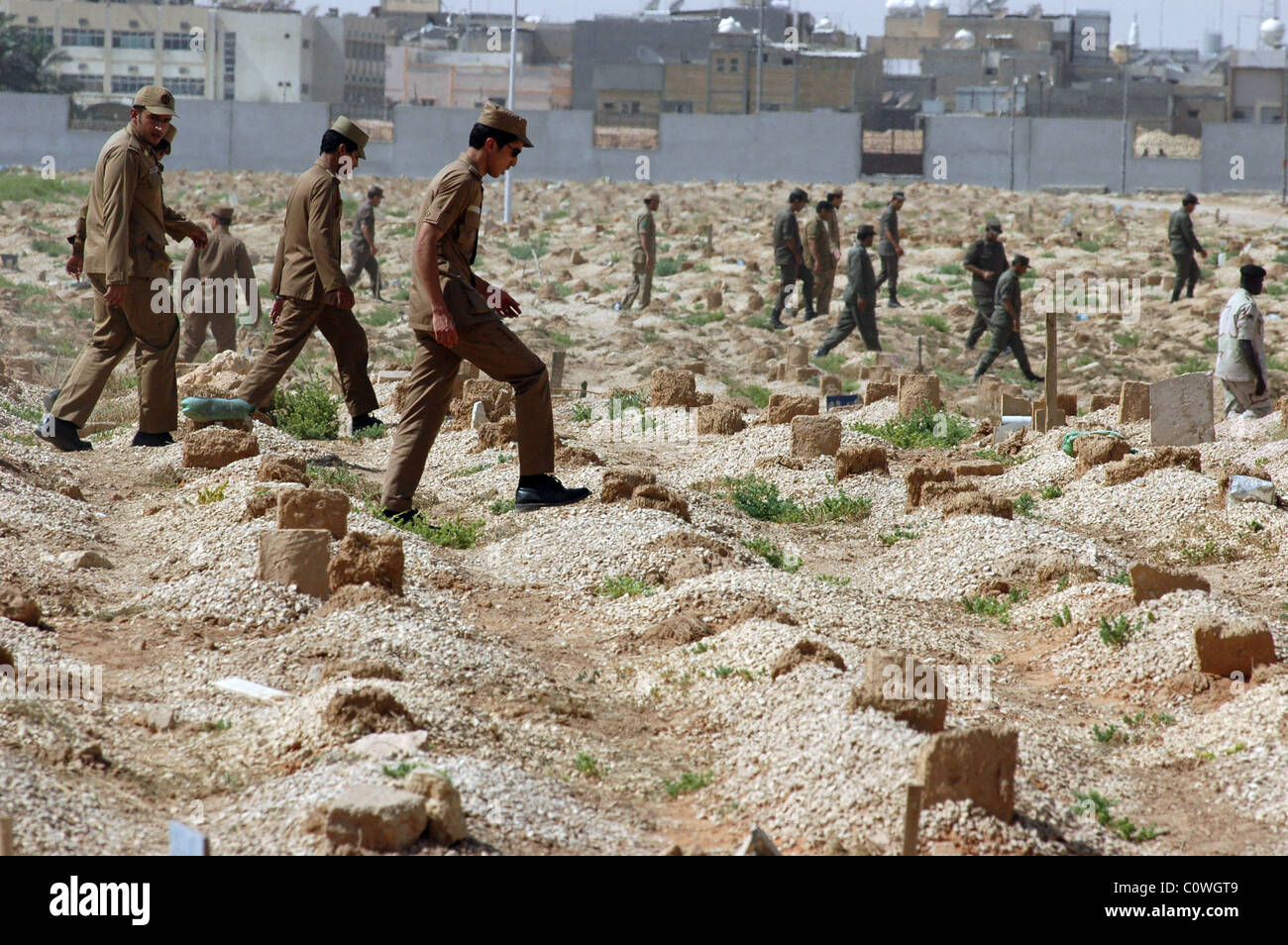 Saudi soldiers comb the Al-Oud cemetery for security immediately ...