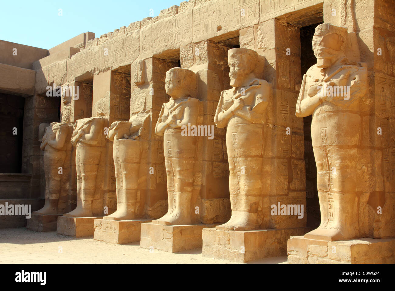 ancient egypt pharaoh statues in Luxor karnak temple Stock Photo - Alamy
