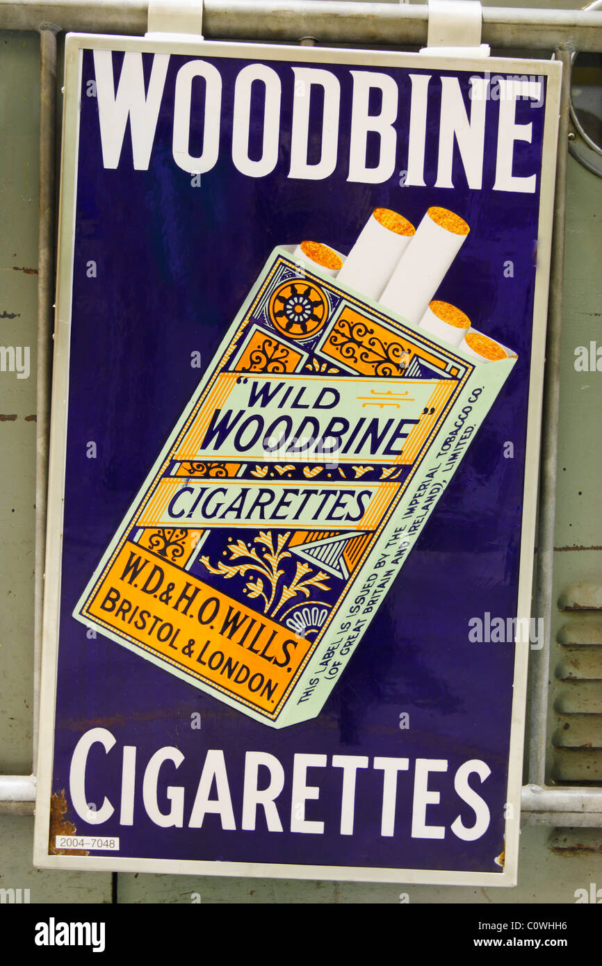 Old metal Woodbine cigarettes sign Stock Photo - Alamy