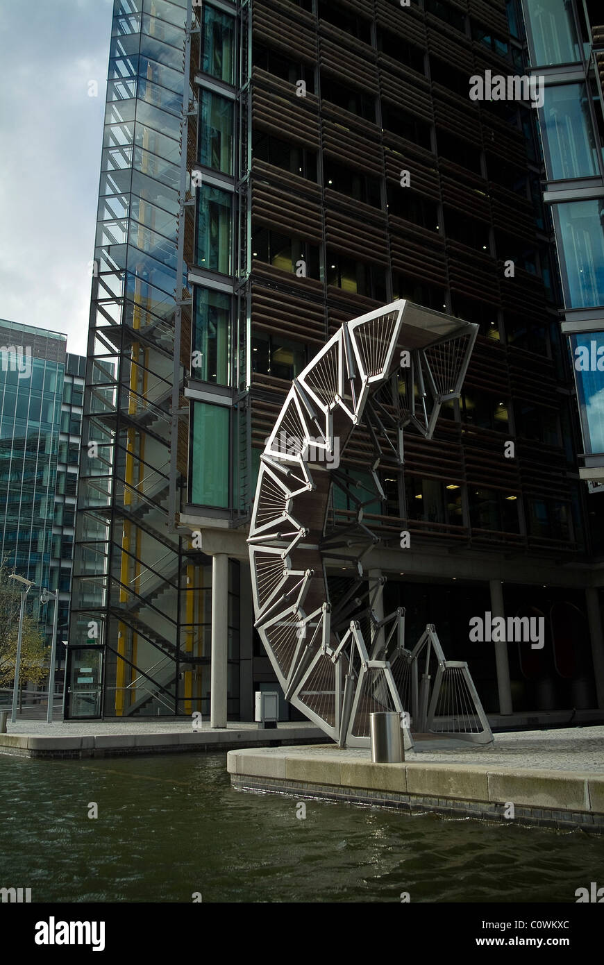 Heatherwick Studio's Rolling Bridge at Paddington Basin, London, UK ...